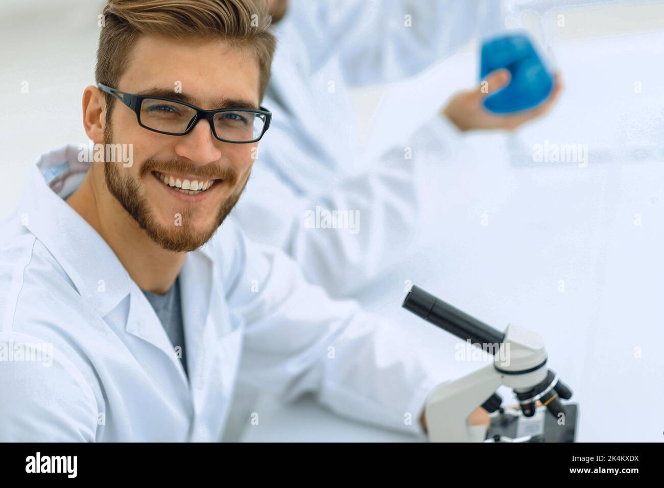 closeup. a biologist working in the laboratory Stock Photo - Alamy