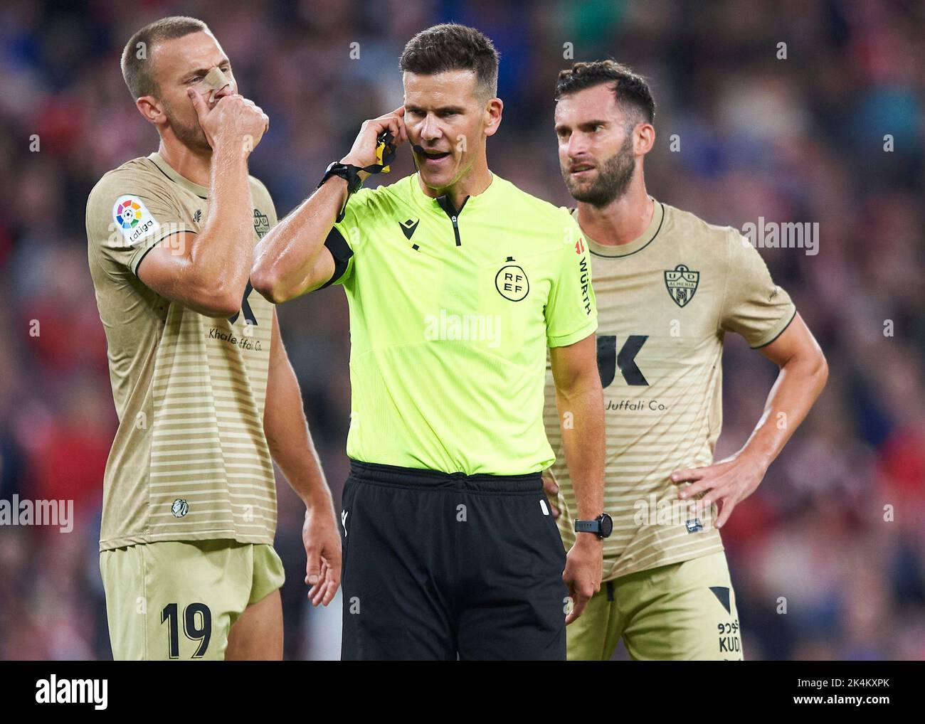 The refefee Juan Luis Pulido Santana, Rodrigo Ely and Leo Baptistao of UD Almeria during the La ...