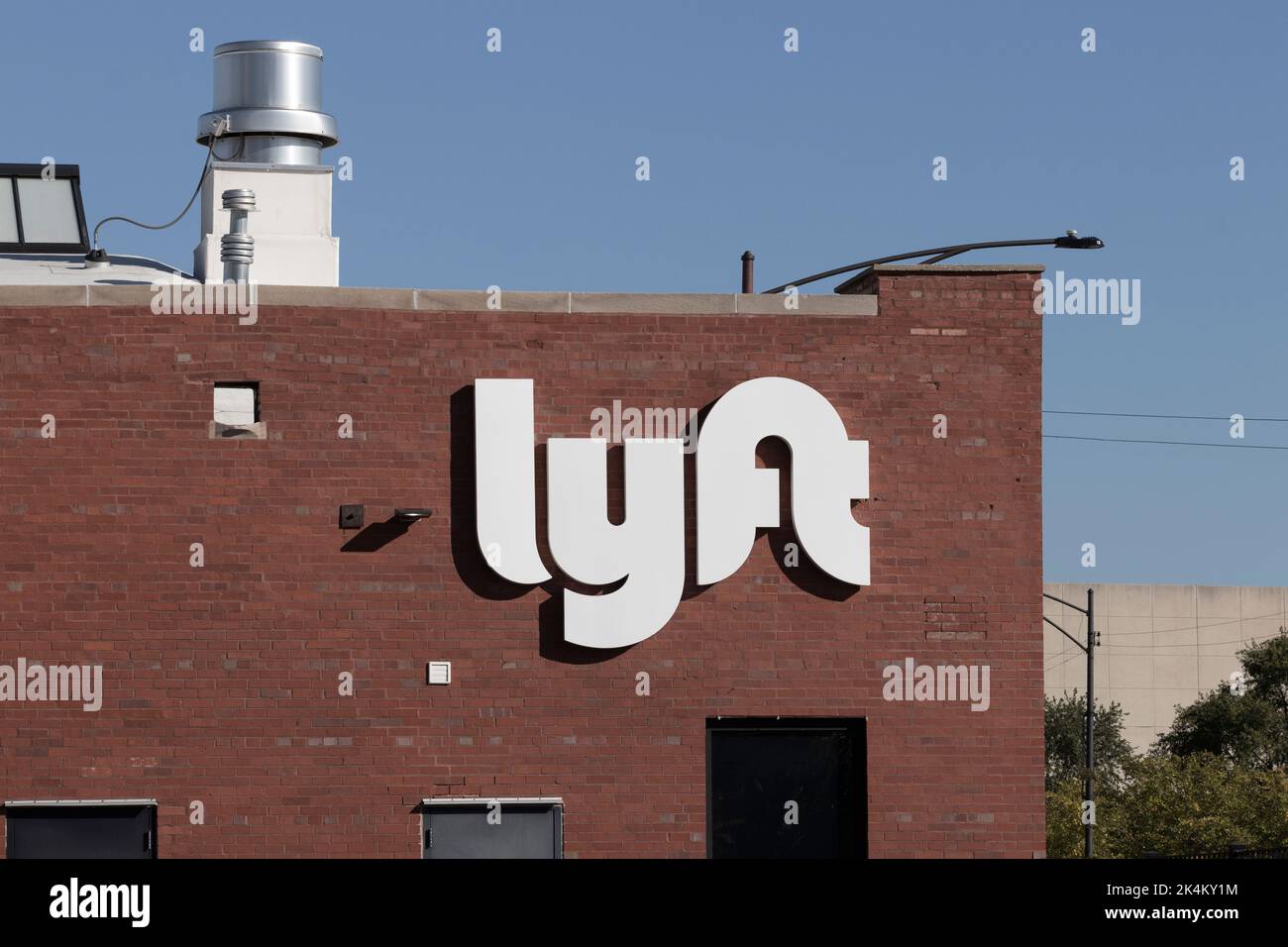 Chicago - Circa October 2022: Lyft Driver Center. Lyft offers ride ...