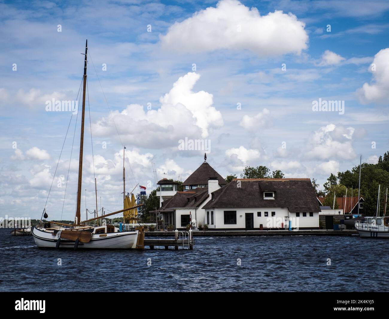 A sailboat with leeboard at an island restaurant Leiden, Holland Stock ...