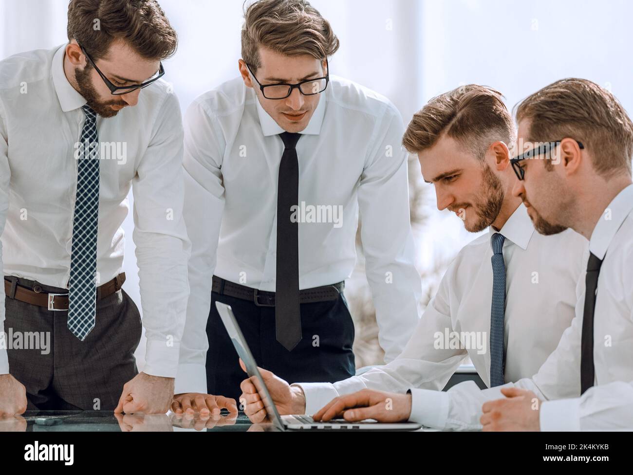 group of employees discussing the incoming information Stock Photo - Alamy