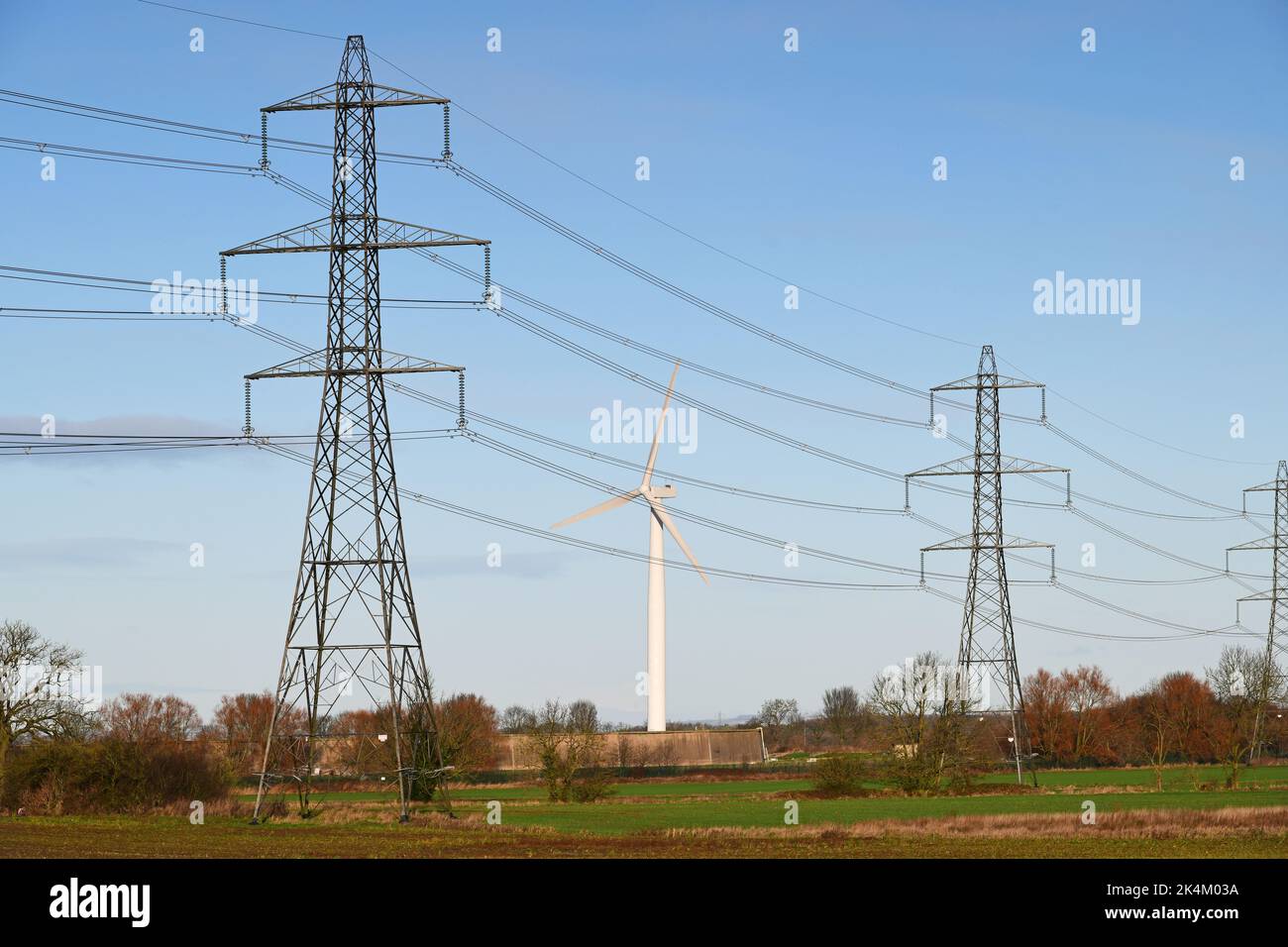 looking through giant electricity pylons to windmill selby yorshire ...
