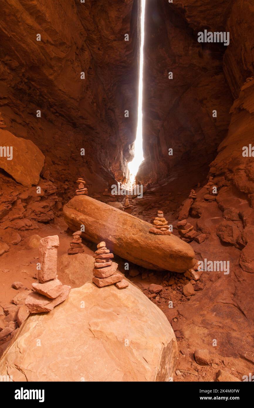 Rock cairns in the tunnel on the Joint Trail into Chesler Park in the ...