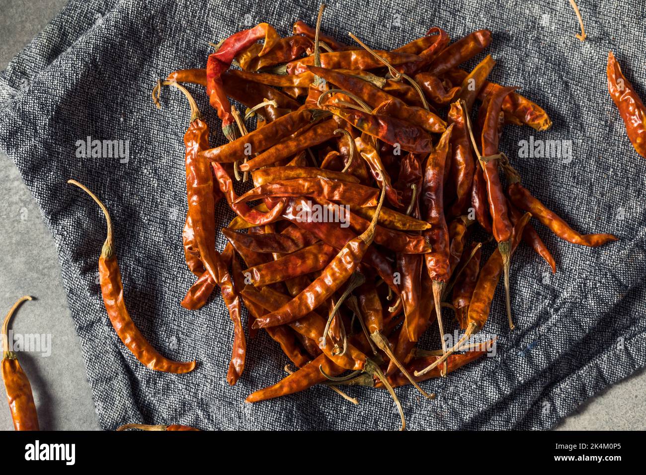 Dry Red Organic Chile De Arbol Peppers in a Bunch Stock Photo - Alamy