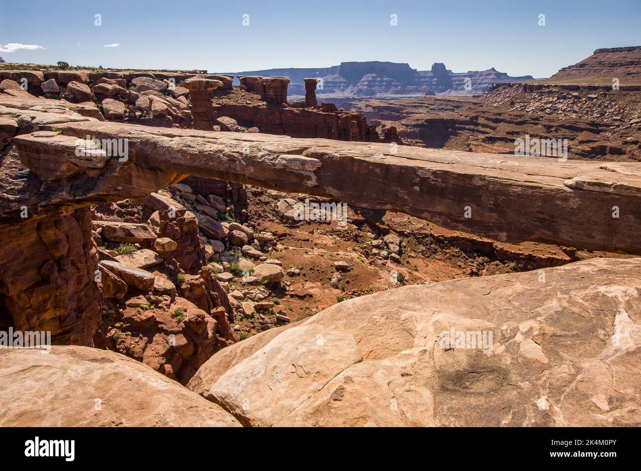 Musselman Arch is flat natural bridge of White Rim sandstone on the ...