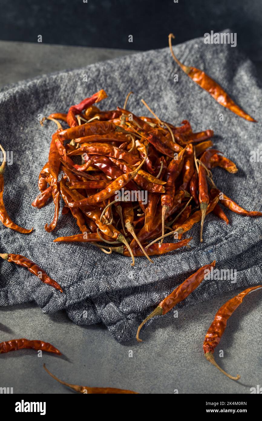 Dry Red Organic Chile De Arbol Peppers in a Bunch Stock Photo - Alamy