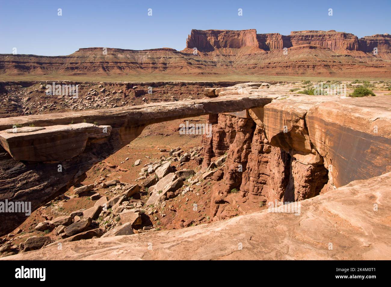 Musselman Arch is flat natural bridge of White Rim sandstone on the ...