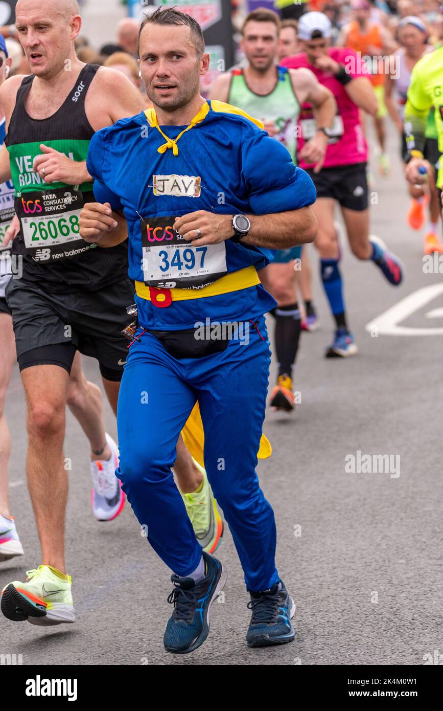 Javed Alikhan running in the TCS London Marathon 2022, on Tower Bridge ...