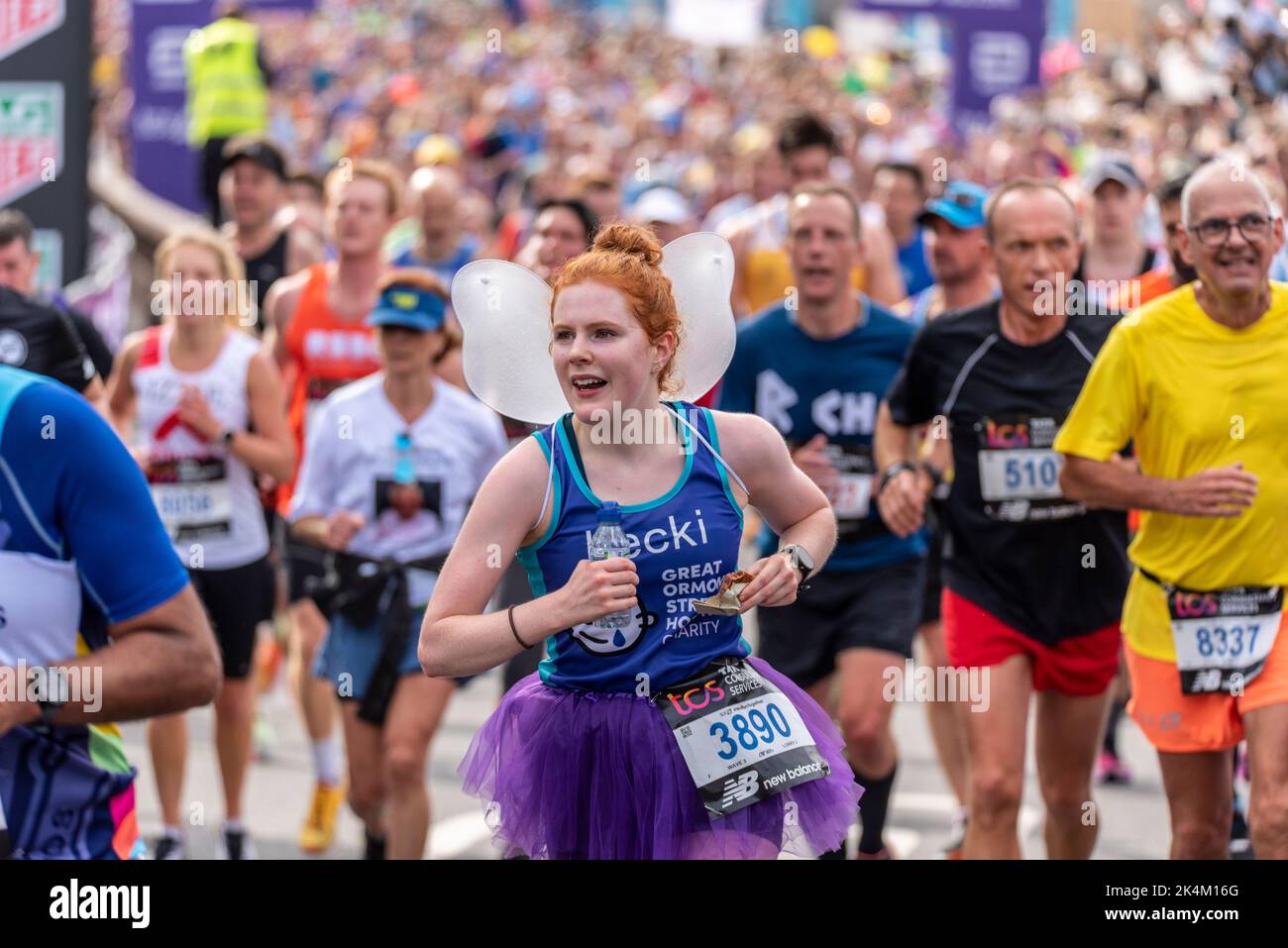 Rebecca Kealy running in the TCS London Marathon 2022, on Tower Bridge ...