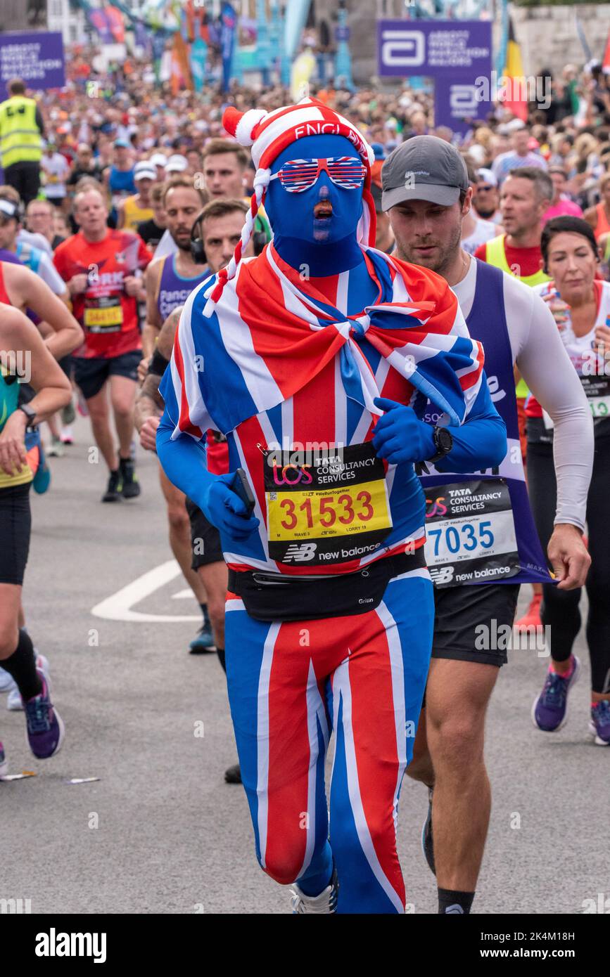 Calum Titley running in the TCS London Marathon 2022, on Tower Bridge ...