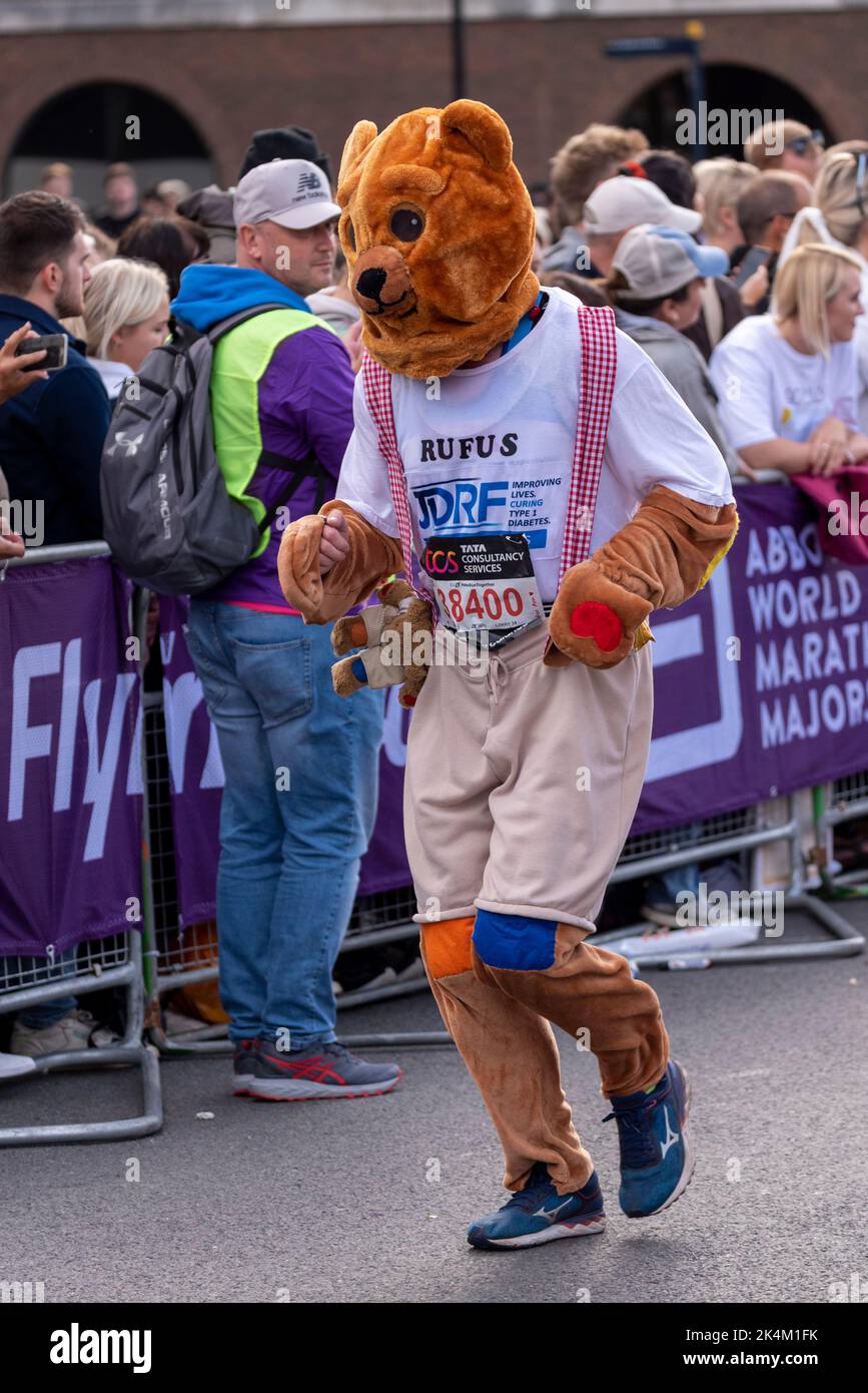 Mark Conlin running in the TCS London Marathon 2022, on Tower Bridge ...