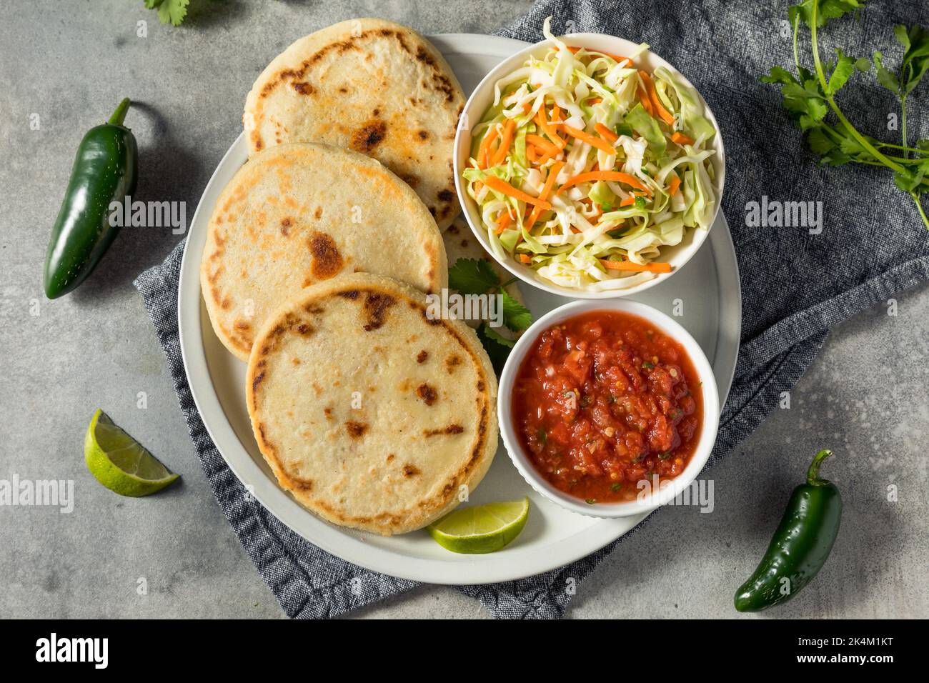 Homemade Salvadoran Corn Pupusas with Curtido and Salsa Stock Photo - Alamy