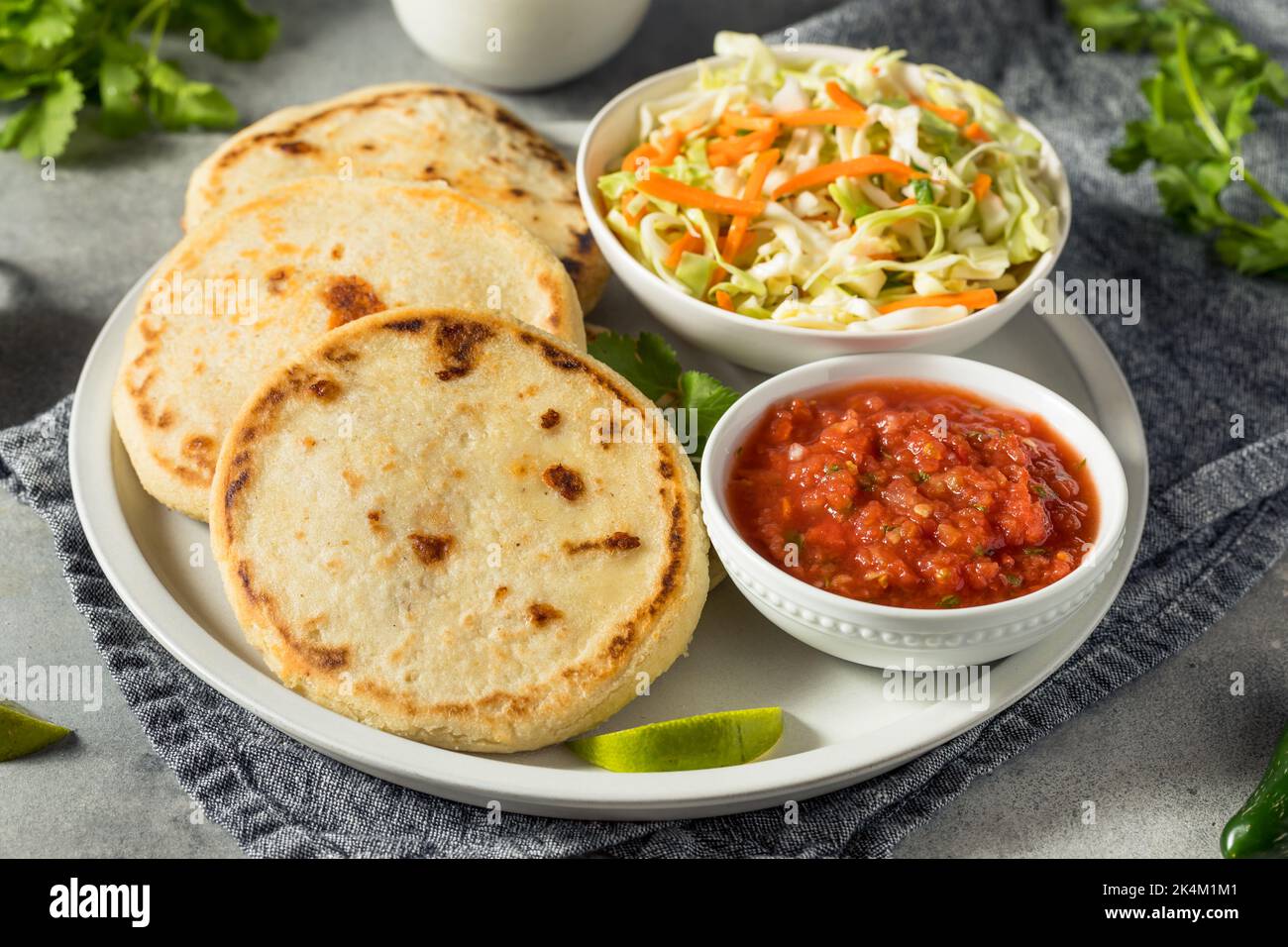 Homemade Salvadoran Corn Pupusas with Curtido and Salsa Stock Photo - Alamy