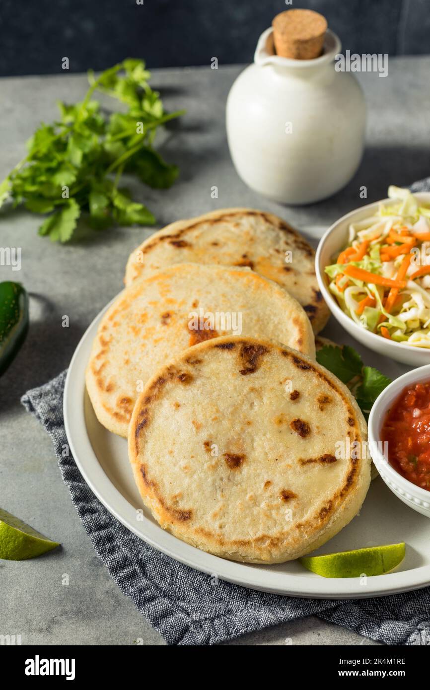 Homemade Salvadoran Corn Pupusas with Curtido and Salsa Stock Photo - Alamy