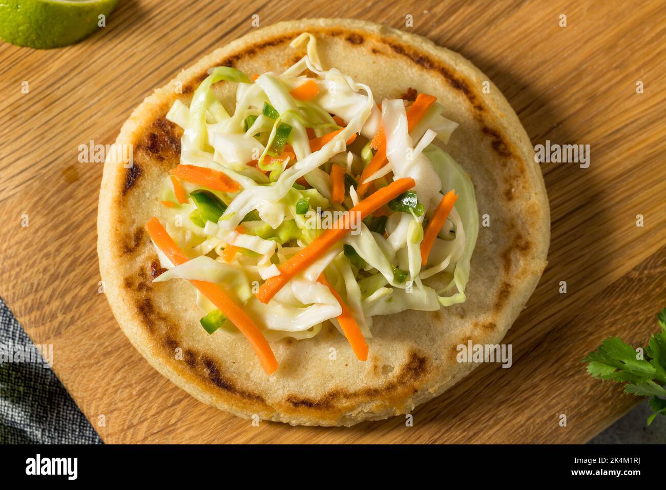 Homemade Salvadoran Corn Pupusas with Curtido and Salsa Stock Photo - Alamy