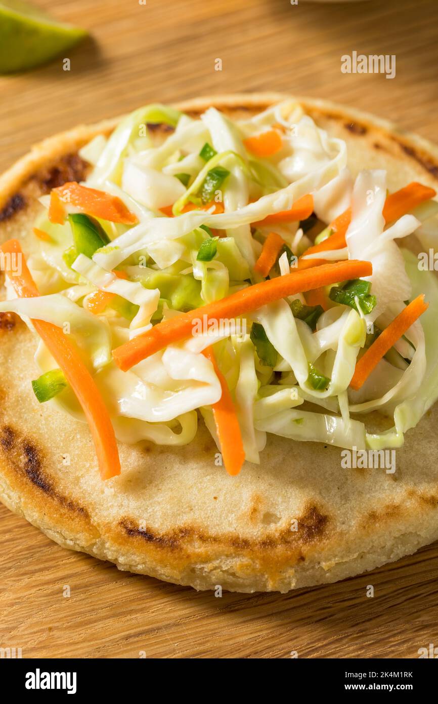 Homemade Salvadoran Corn Pupusas with Curtido and Salsa Stock Photo - Alamy