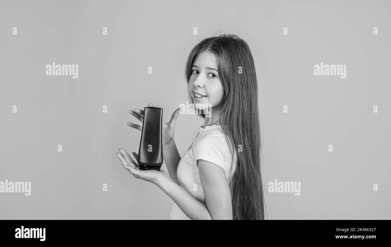 Perfect style. daily habits and personal care. child use shampoo in ...