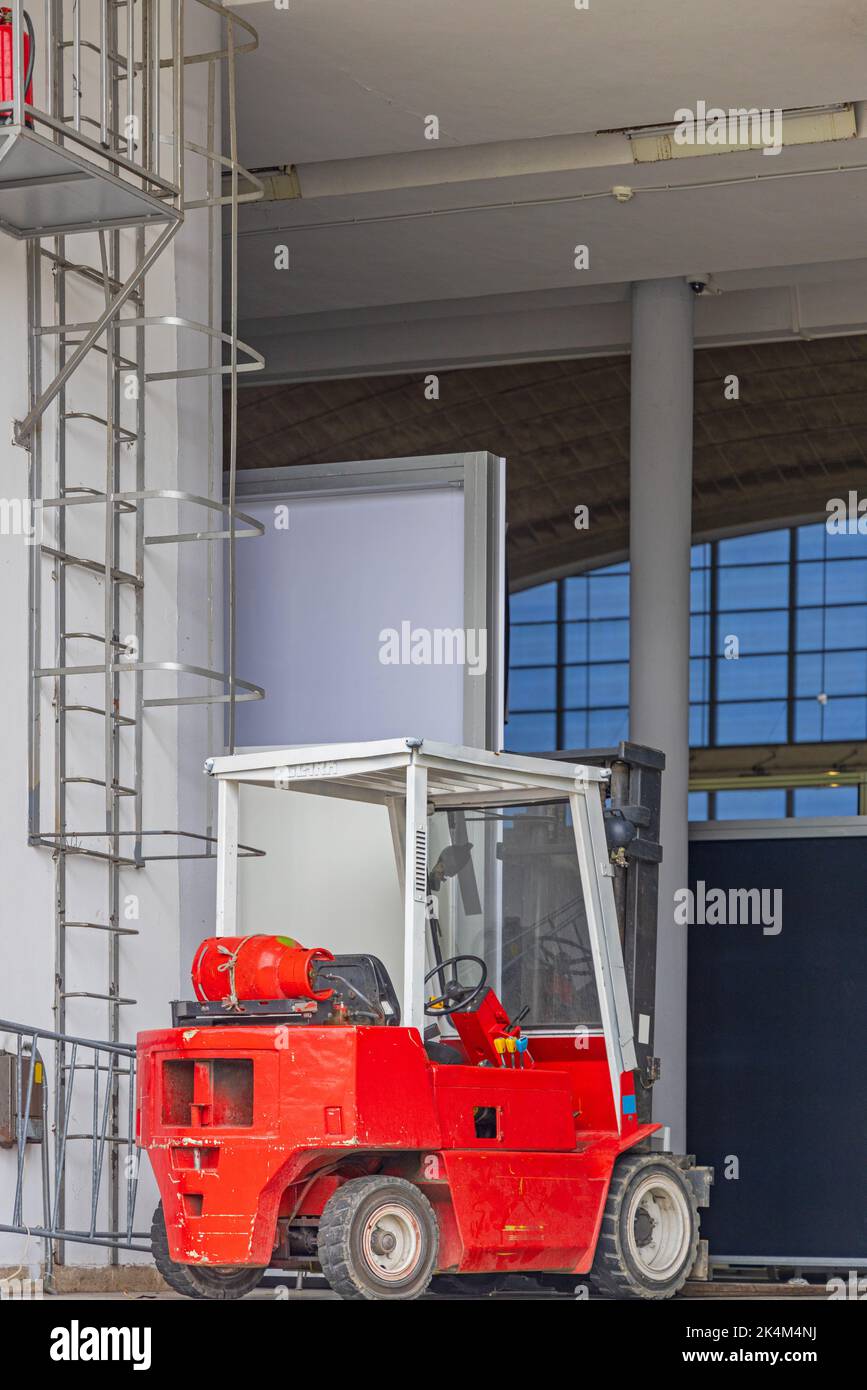 Small Red Gas Powered Forklift Truck in Hall Stock Photo - Alamy