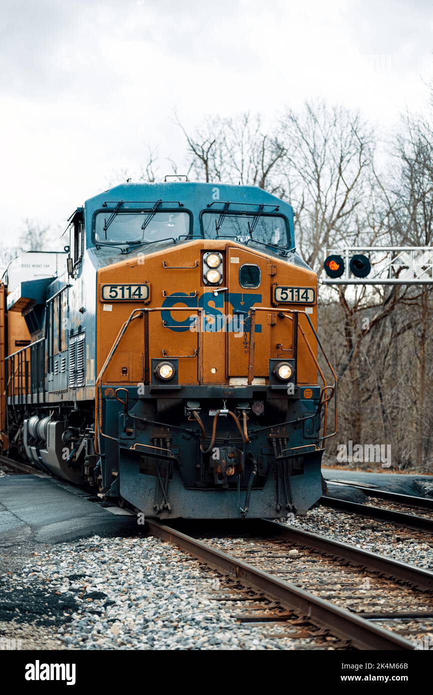 A blue-yellow old train in the railway Stock Photo - Alamy