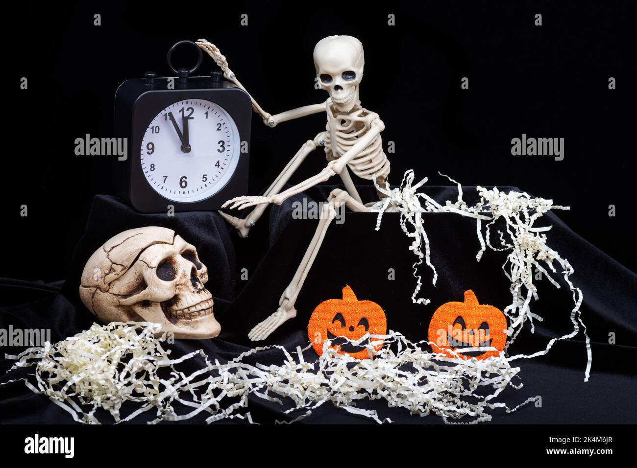 A skeleton waking up, crawling out of the grave, and turning off the ...