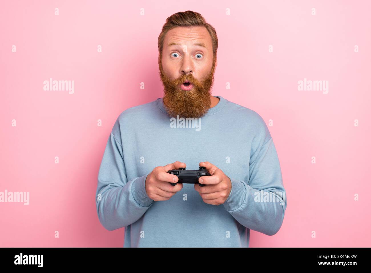 Photo of positive staring guy with ginger hairdo dressed blue sweater ...