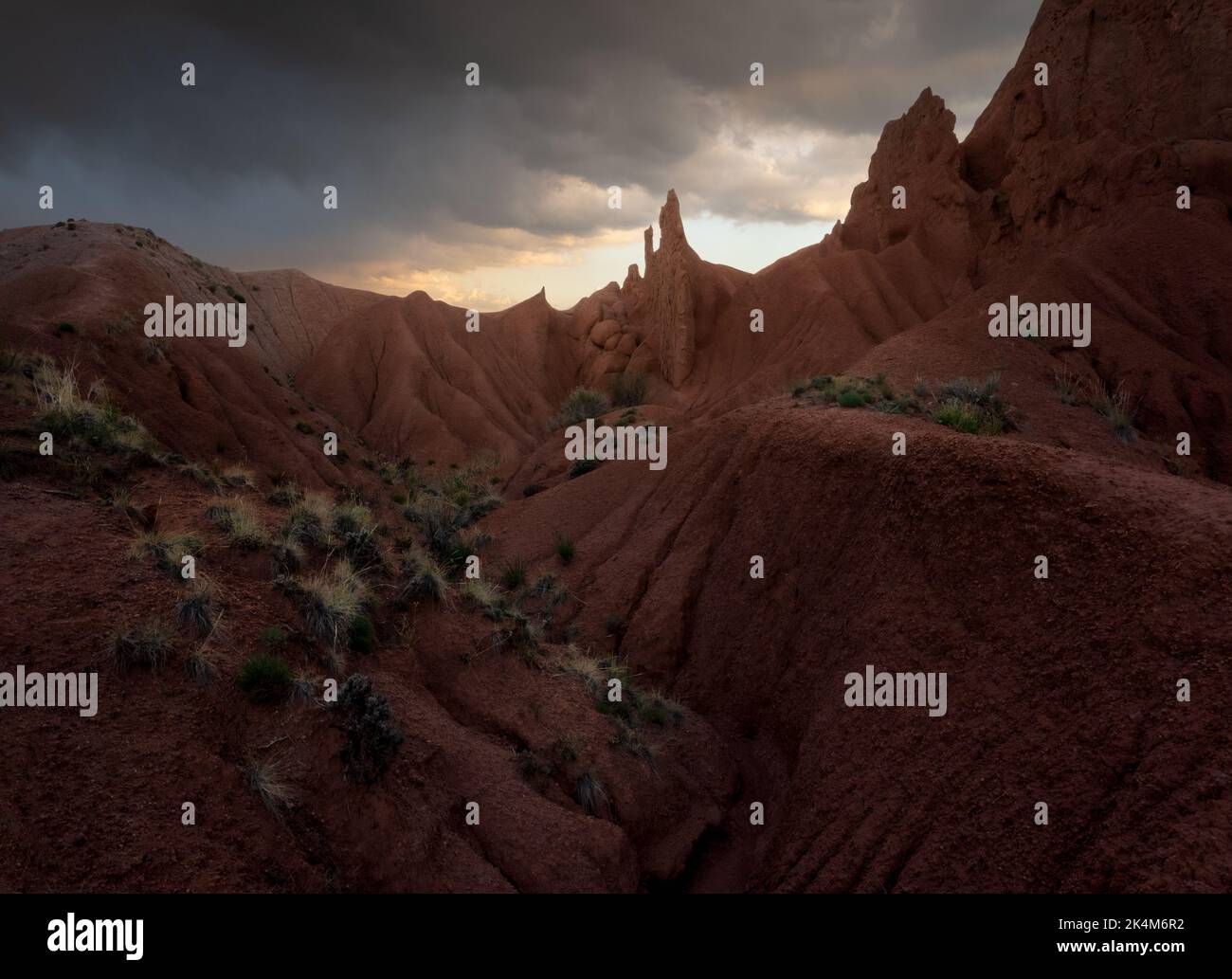 Sharp rock formations and dramatic sunset at colourful Skazka Fairytale ...