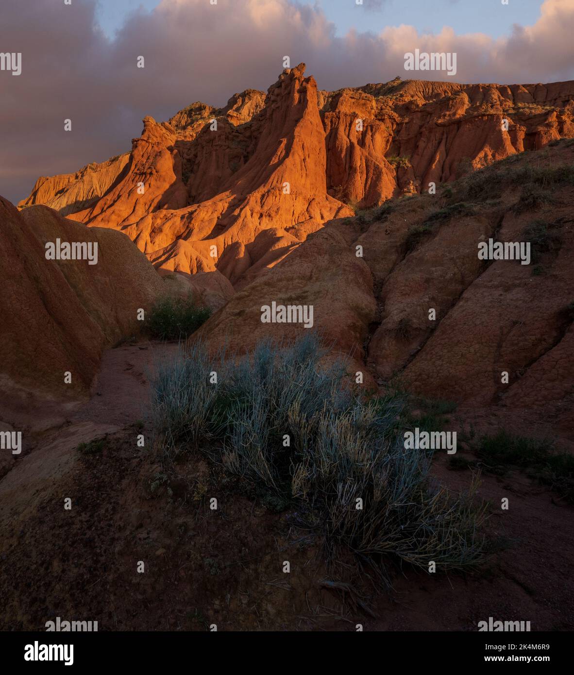 Dramatic sunset at colourful Skazka Fairytale Canyon in Issyk-Kul ...
