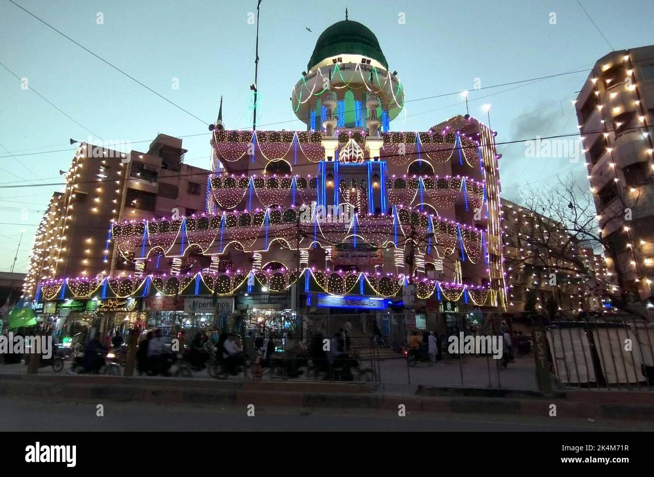 A beautiful illuminated view of Kanzul Emaan Mosque in connection of ...