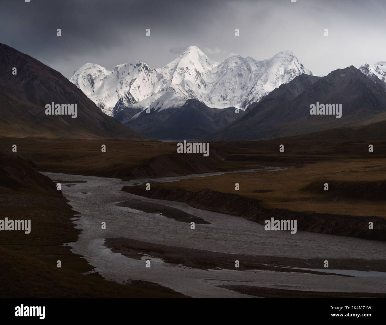 Dramatic snow-capped 5000+ metre tall peaks of Tien Shan mountains in ...