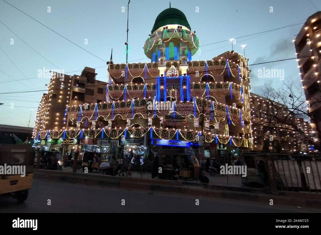A beautiful illuminated view of Kanzul Emaan Mosque in connection of ...