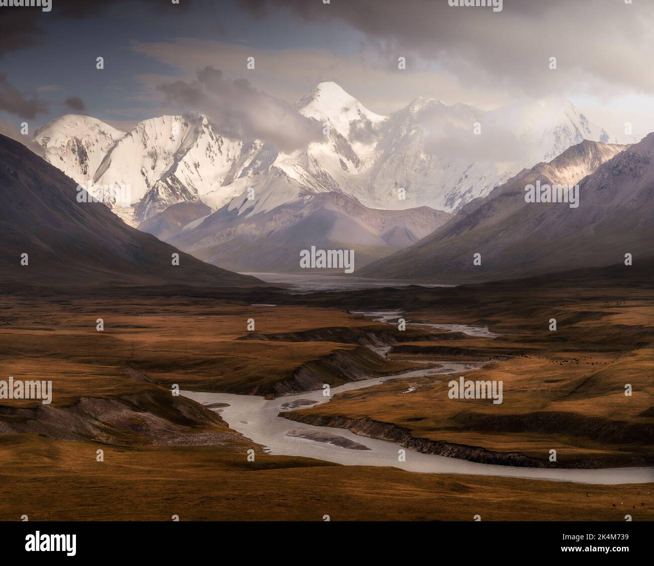 Dramatic snow-capped 5000+ metre tall peaks of Tien Shan mountains in ...