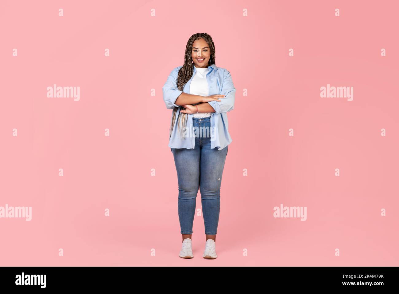 African Obese Woman Standing Crossing Hands Smiling On Pink Background ...
