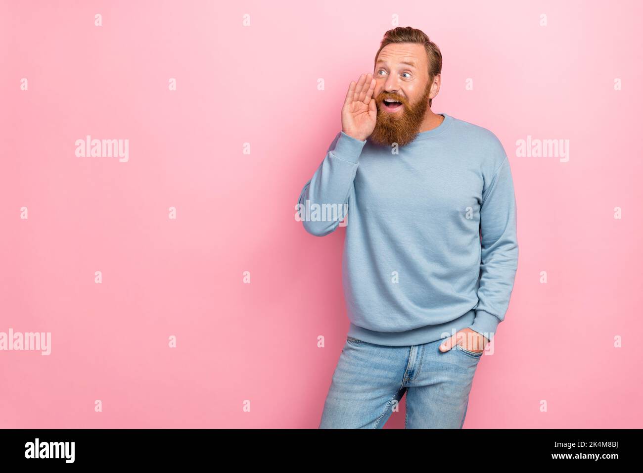 Portrait of handsome good mood guy with ginger hairdo wear blue sweater ...
