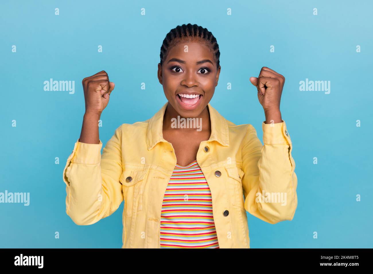 Portrait of attractive cheerful lucky girl rejoicing attainment having ...