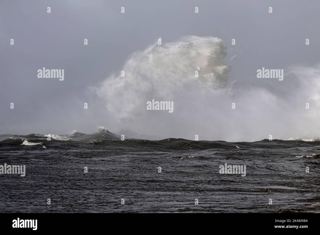 Huge sea wave splash during cyclone Stock Photo - Alamy