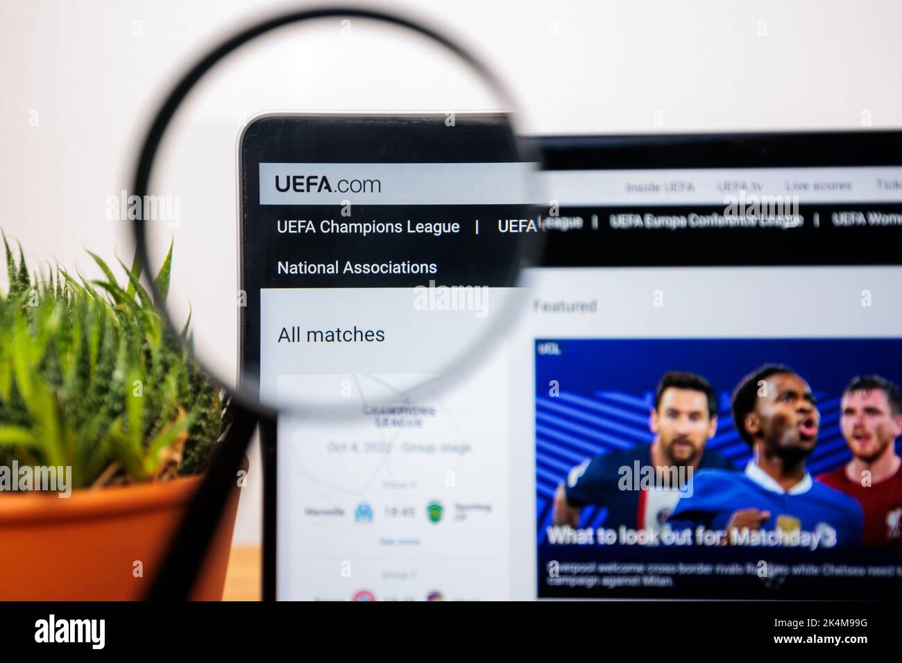 A magnifying glass of the logo of UEFA.com on their website on a laptop ...