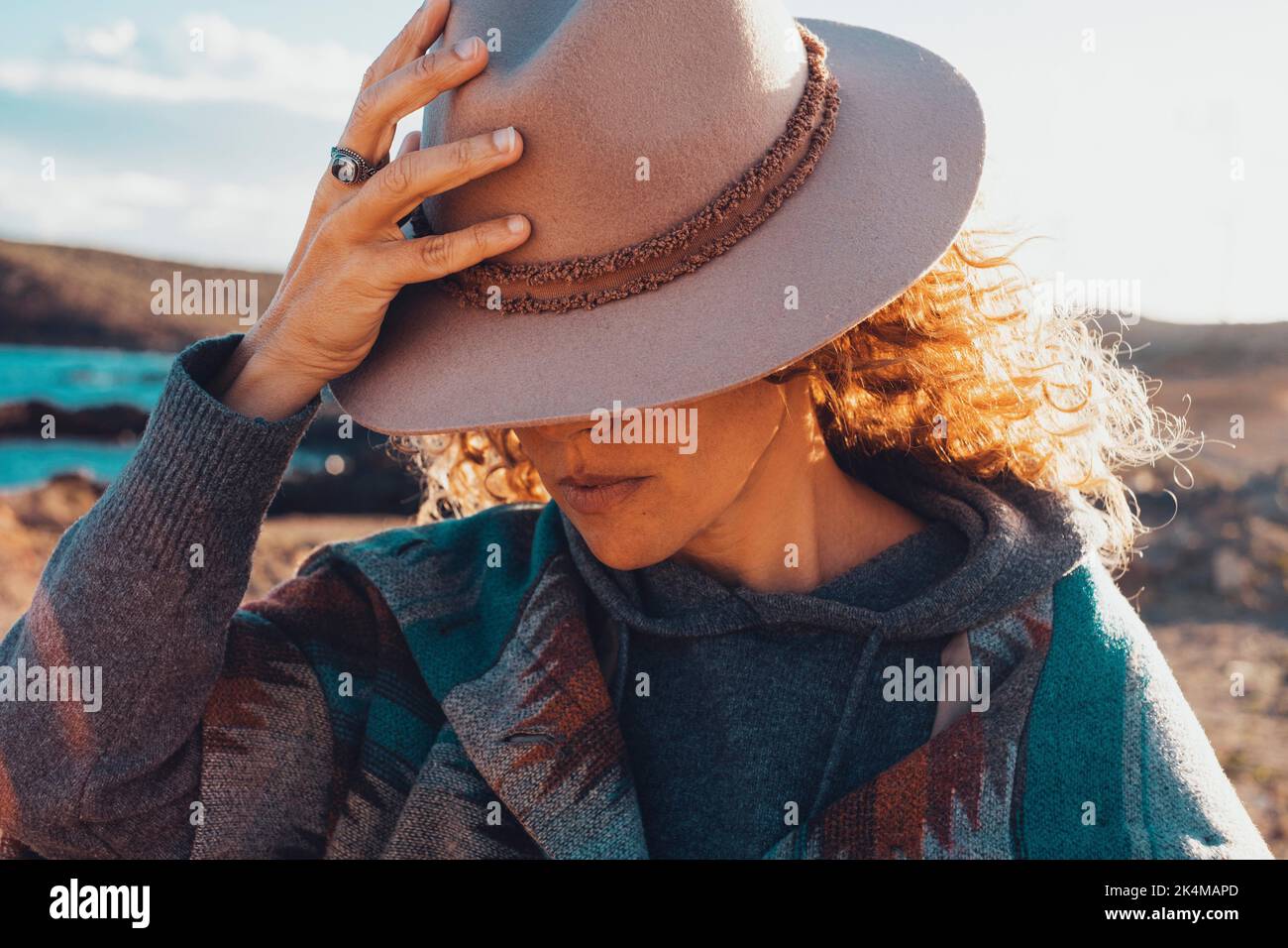 Girl Hiding Face With Hat