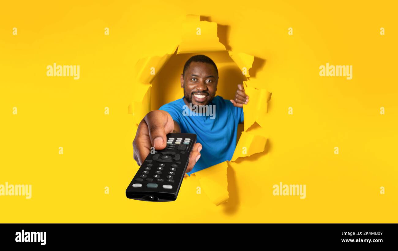 Pointing tv remote hi-res stock photography and images - Alamy