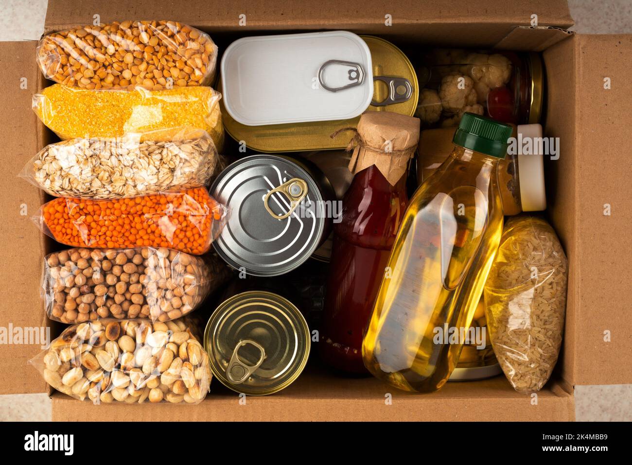Survival set of nonperishable foods in carton box Stock Photo - Alamy