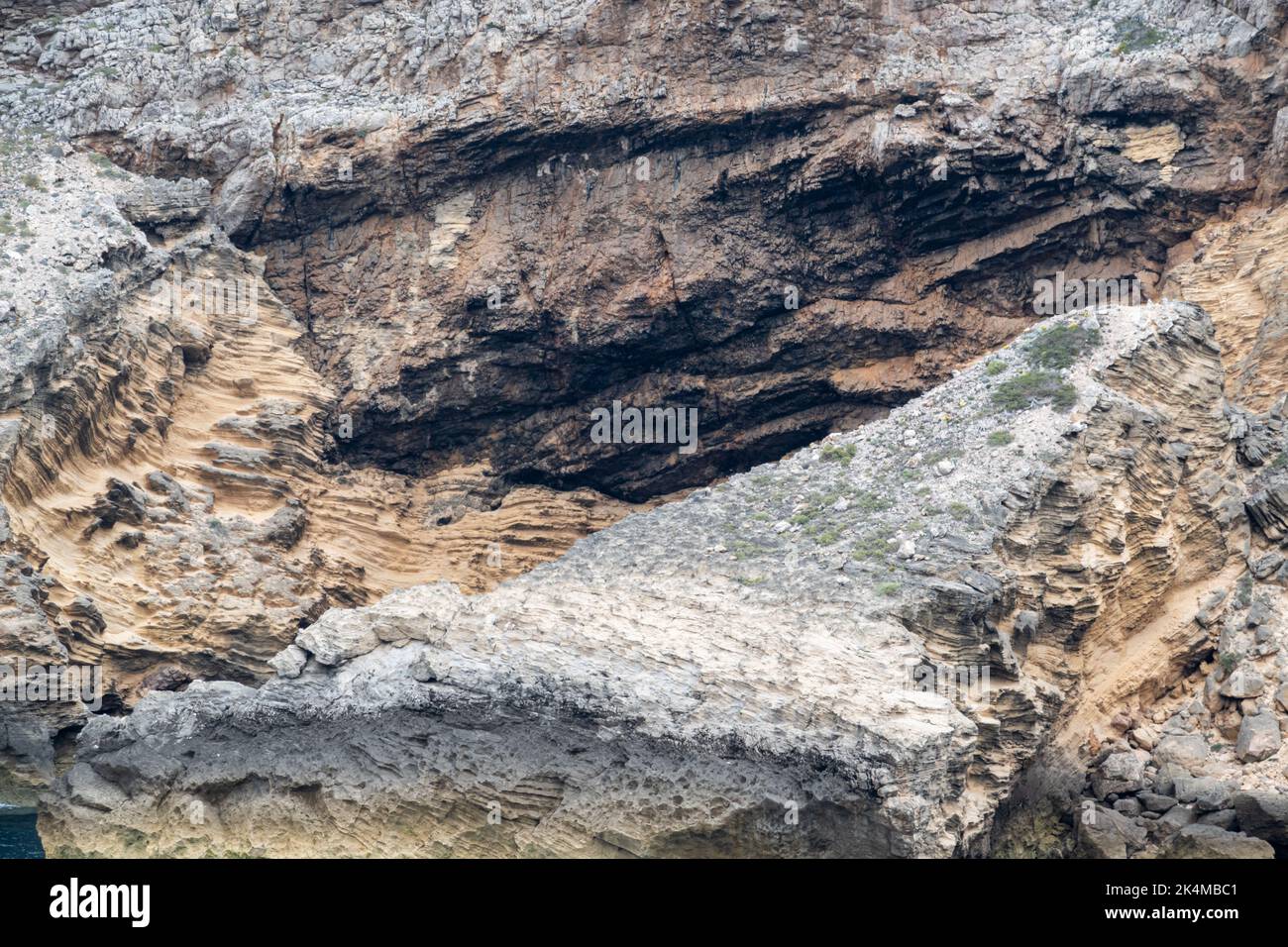Geological rock sediment formation in close-up detail showing patterns ...