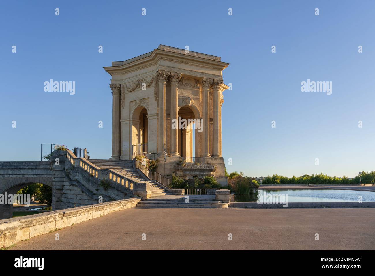 Scenic summer morning view of the ancient water tower stone building ...