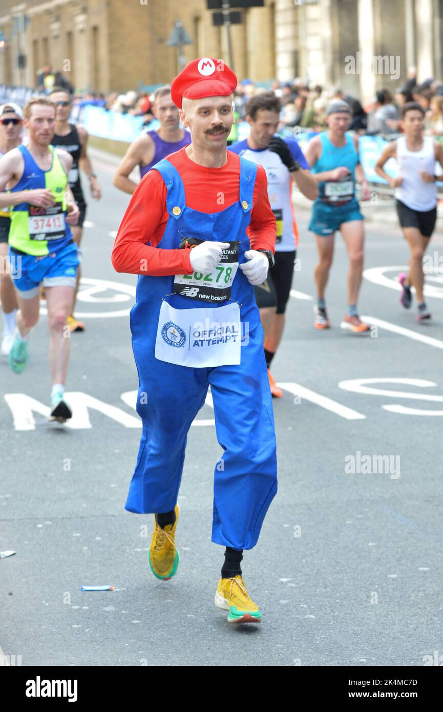 Runner dressed as super mario character during the London Marathon 2022 ...