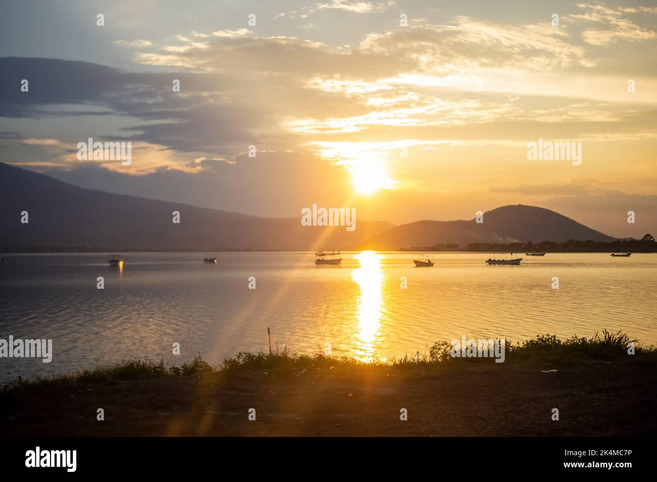 lake of chapala, jalisco mexico, lake at sunset with fishing boats, sun ...