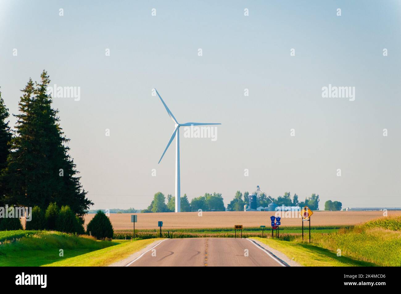 Large wind turbine in a corn field at the end of a road in Dexter ...