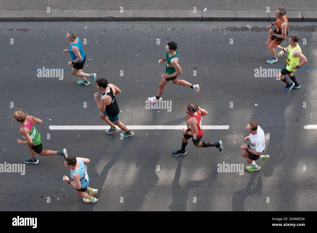 Large group of runners competing in the 2022 London marathon Stock ...