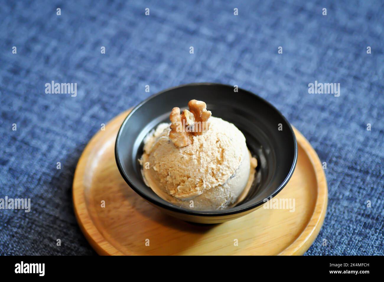 walnut ice cream, peanut ice cream or nut ice cream with walnut topping ...