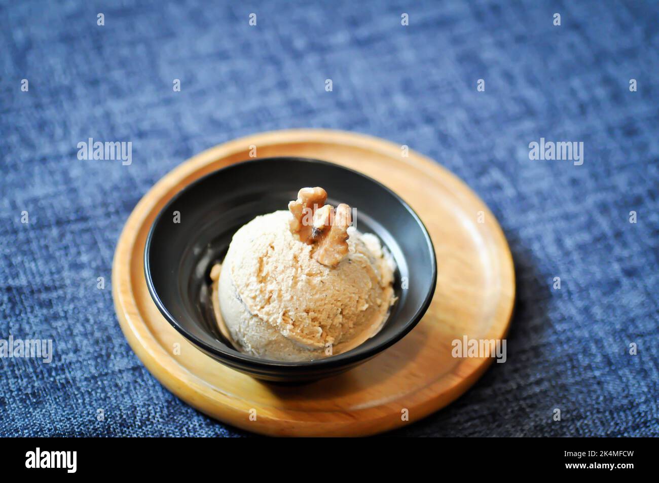walnut ice cream, peanut ice cream or nut ice cream with walnut topping ...