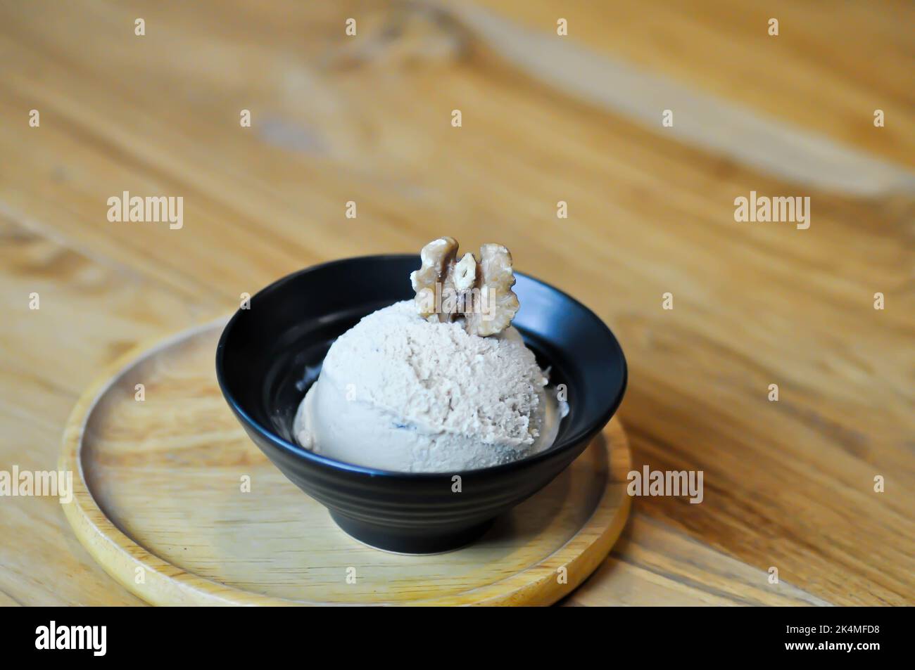 walnut ice cream, peanut ice cream or nut ice cream with walnut topping ...