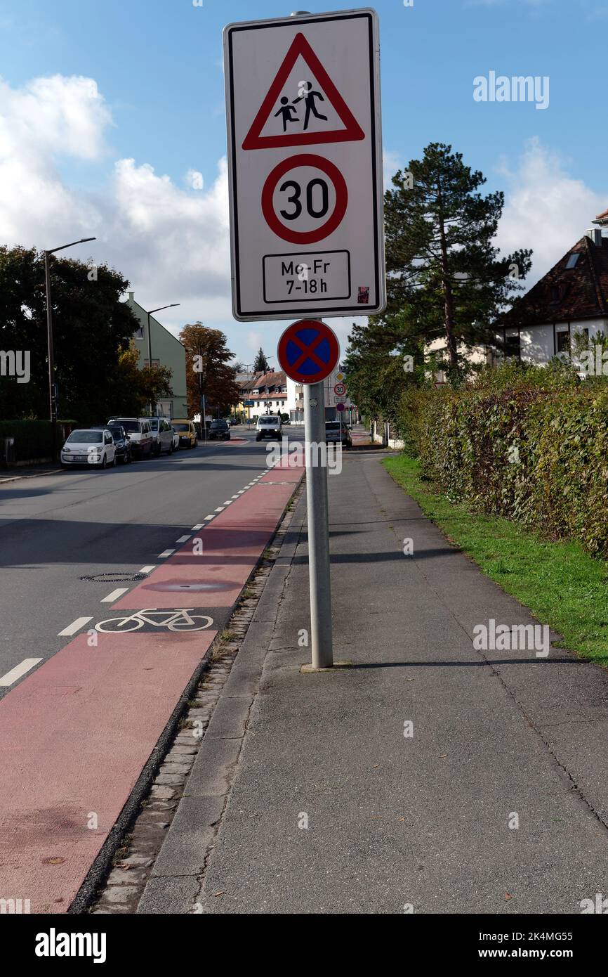 Traffic change in the city, traffic calming: sign with speed 30, play ...