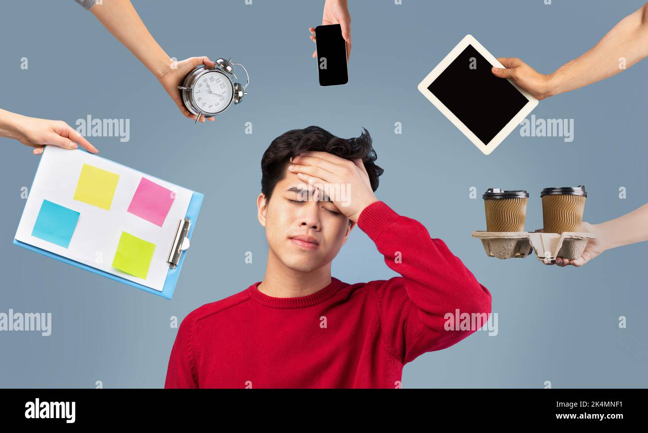 Exhausted sad asian man tablet hi-res stock photography and images - Alamy